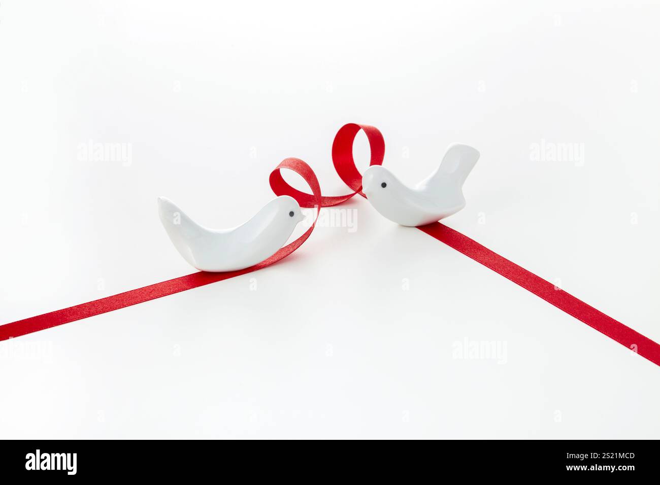 Ribbon Dove, symbol of peace (White dove with red ribbon Stock Photo ...