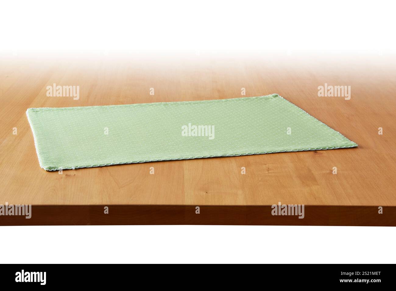 Wooden table and luncheon mat Stock Photo - Alamy