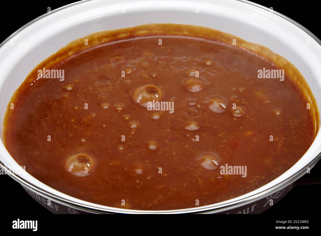 Cooking curry in a kitchen hi-res stock photography and images - Alamy