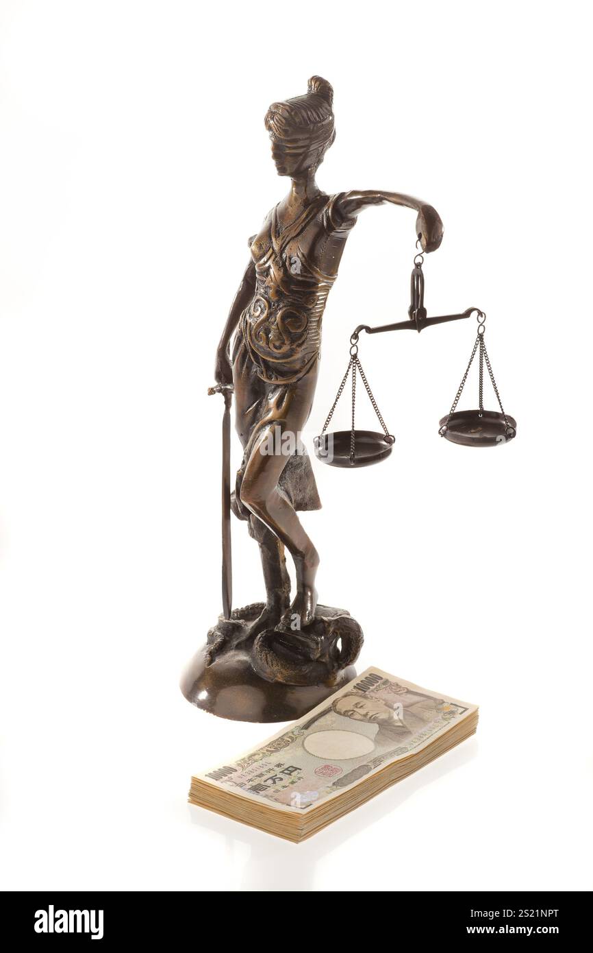 Justitia with scales and yen. Symbol for justice Stock Photo - Alamy