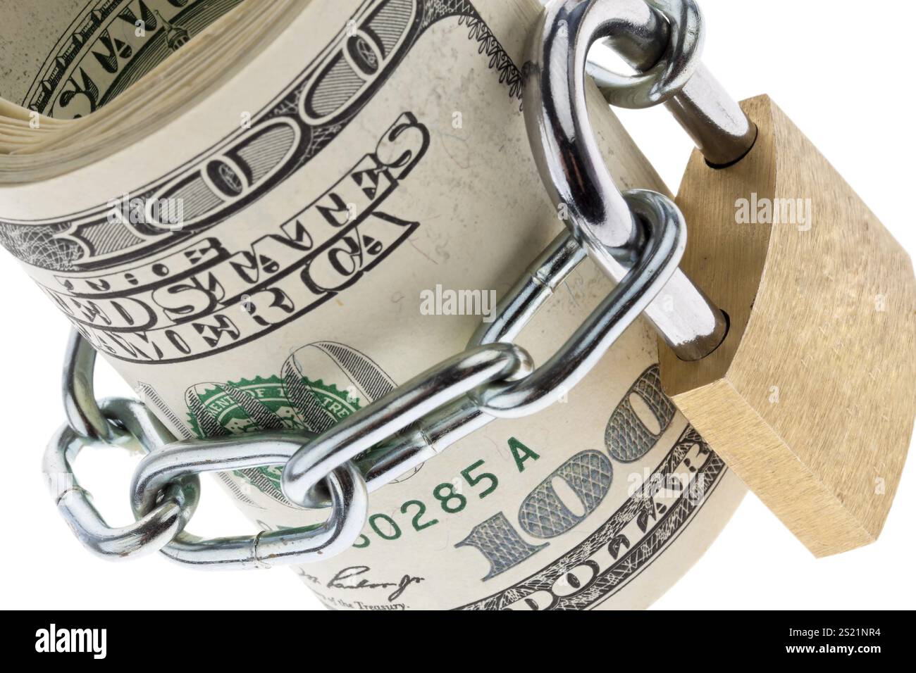 Many dollar banknotes are locked with a lock Stock Photo - Alamy