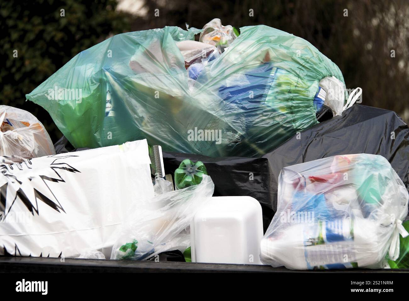 A waste separation collection point for plastic waste. Packed in bags ...
