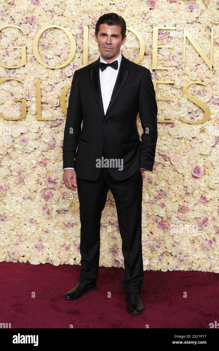 Sacha Skarbek arrives at the 82nd Golden Globes on Sunday, Jan. 5, 2025 ...