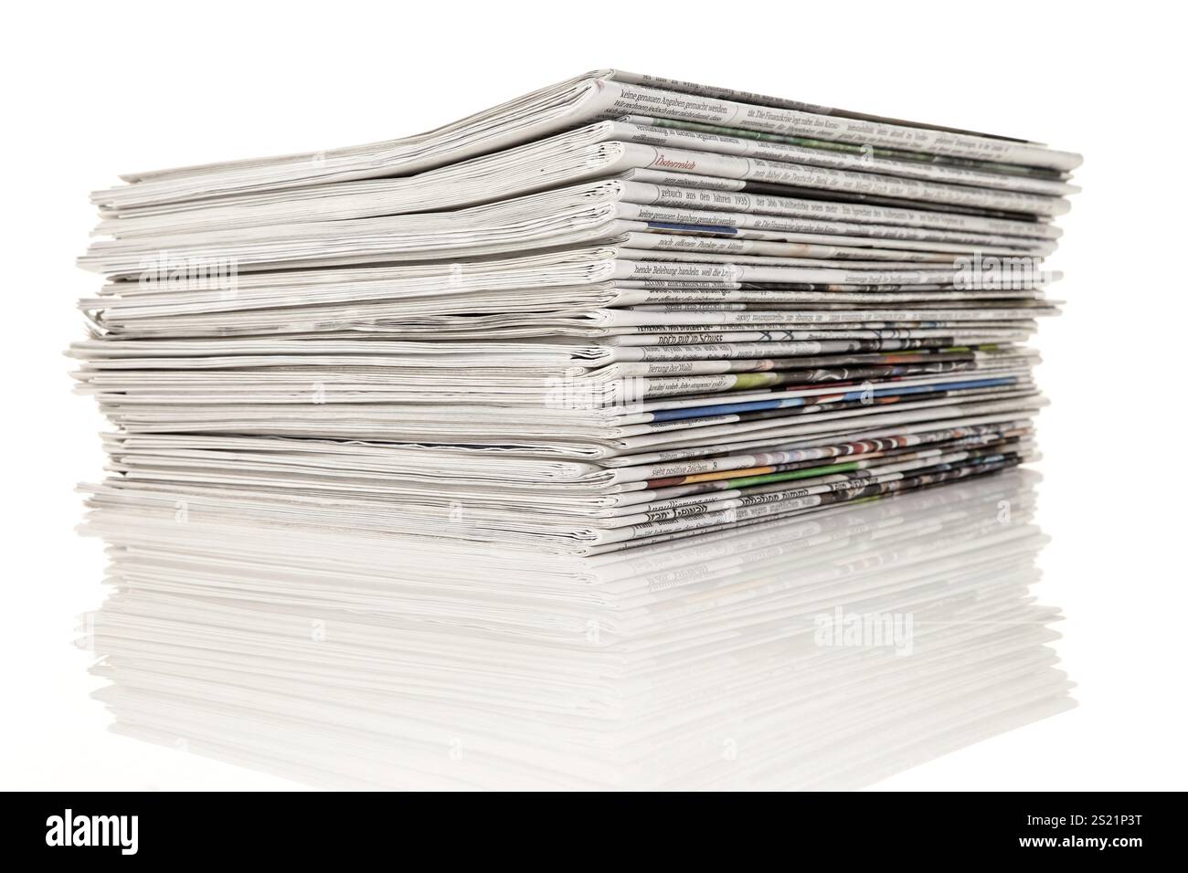 Old newspapers and magazines in a pile Austria Stock Photo - Alamy