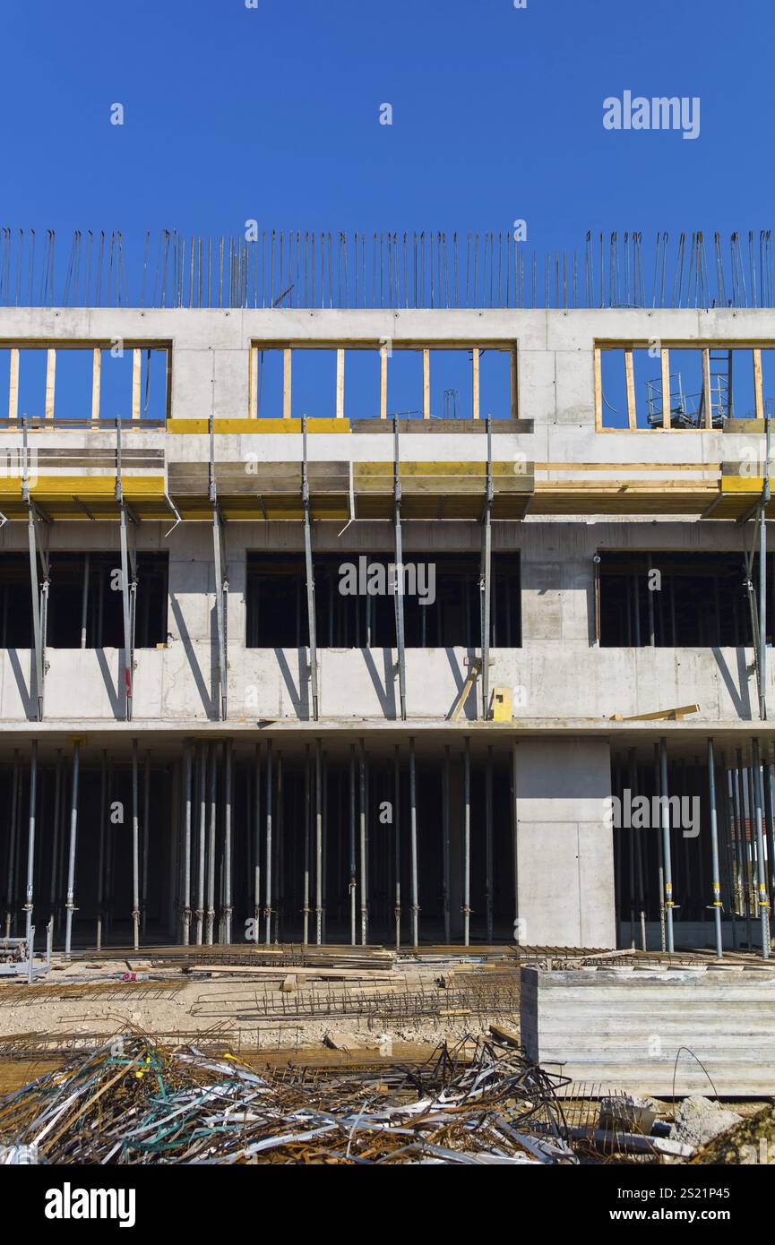 A concrete house or hall is being built. Building site. Formwork for ...