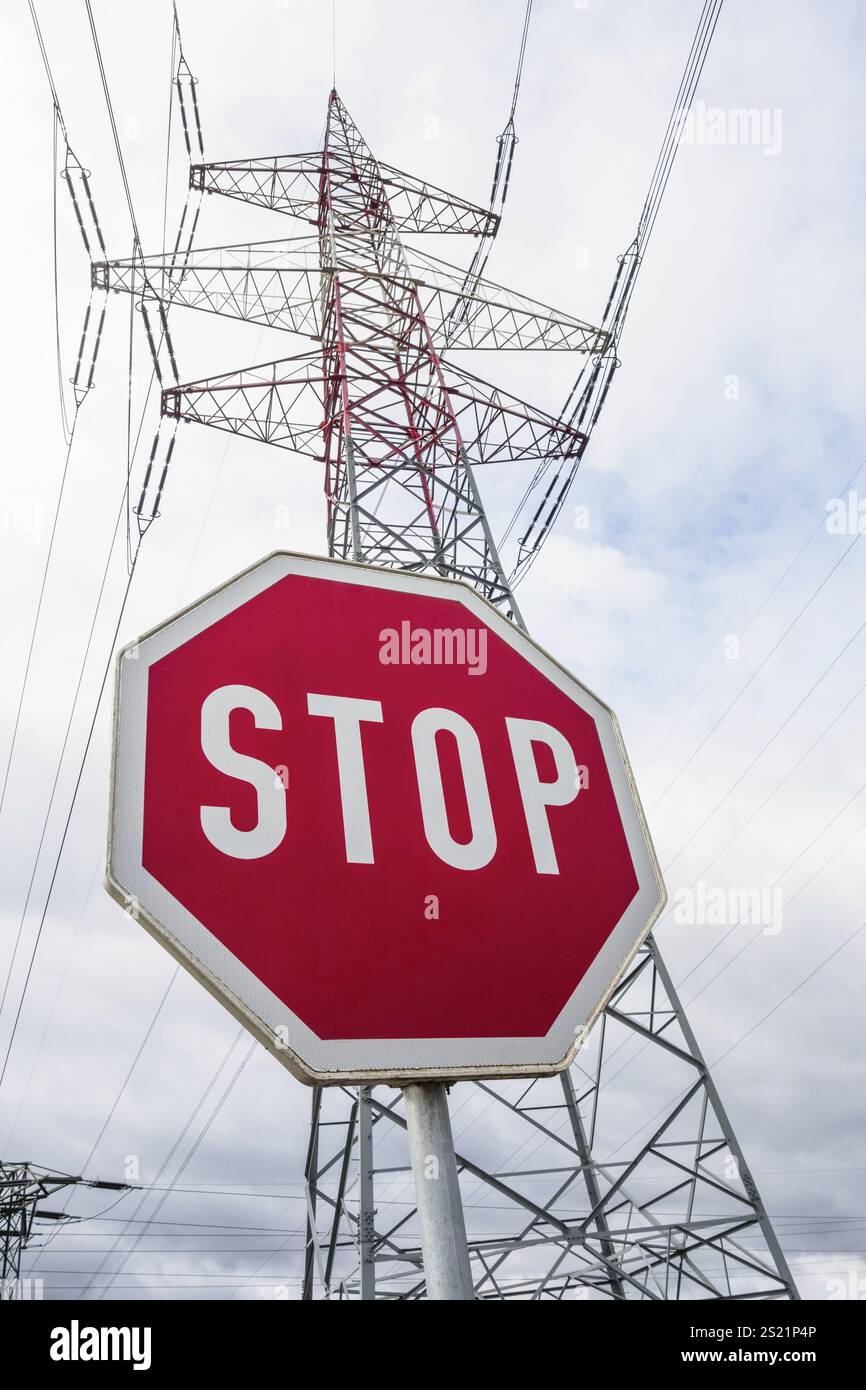 Power line and stop sign. Symbolic photo for the end or change in ...