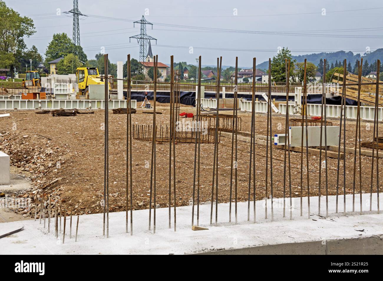 On a construction site there are steel grids to reinforce the concrete ...
