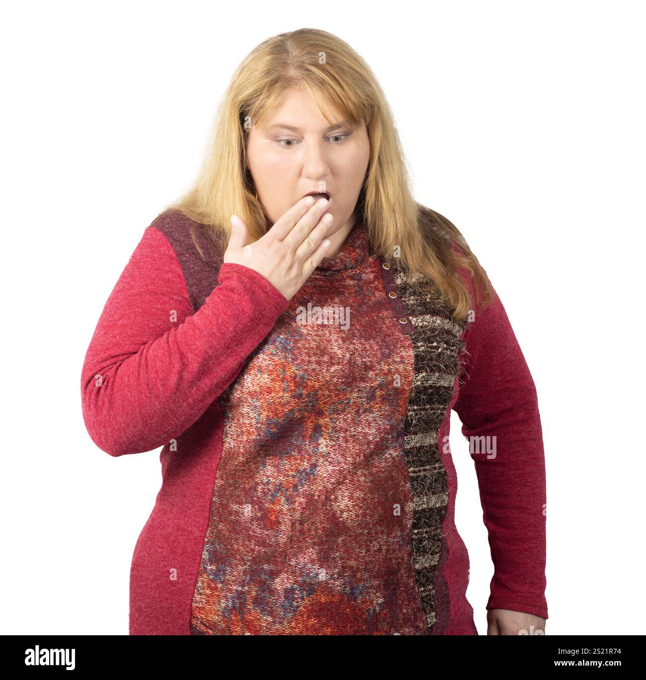 A woman with long blonde hair is captured in a surprised pose, covering ...