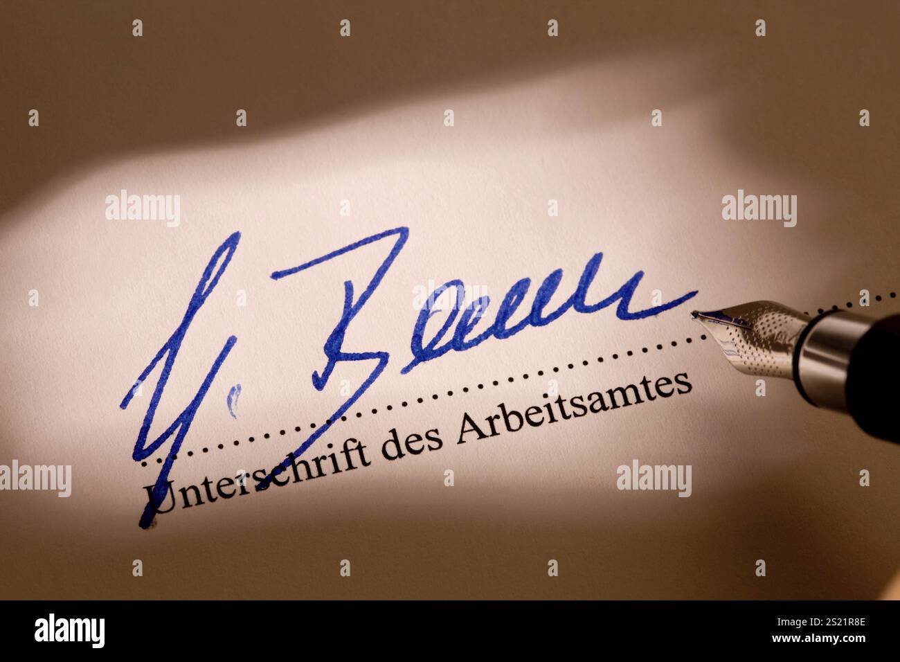 Signature of the labour office employee under a document Stock Photo ...