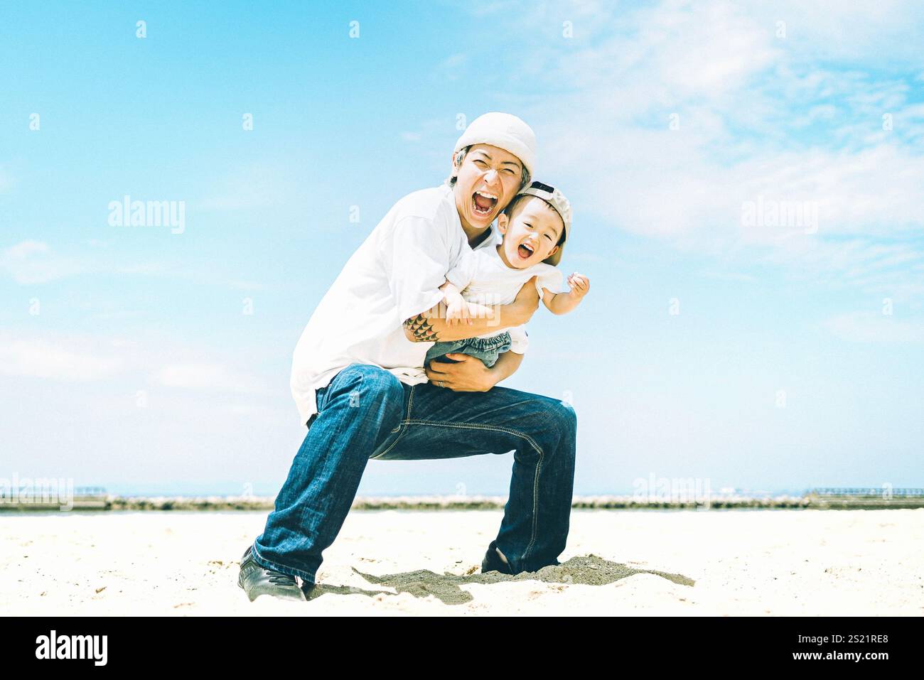 Parent and child getting along outdoors Stock Photo - Alamy