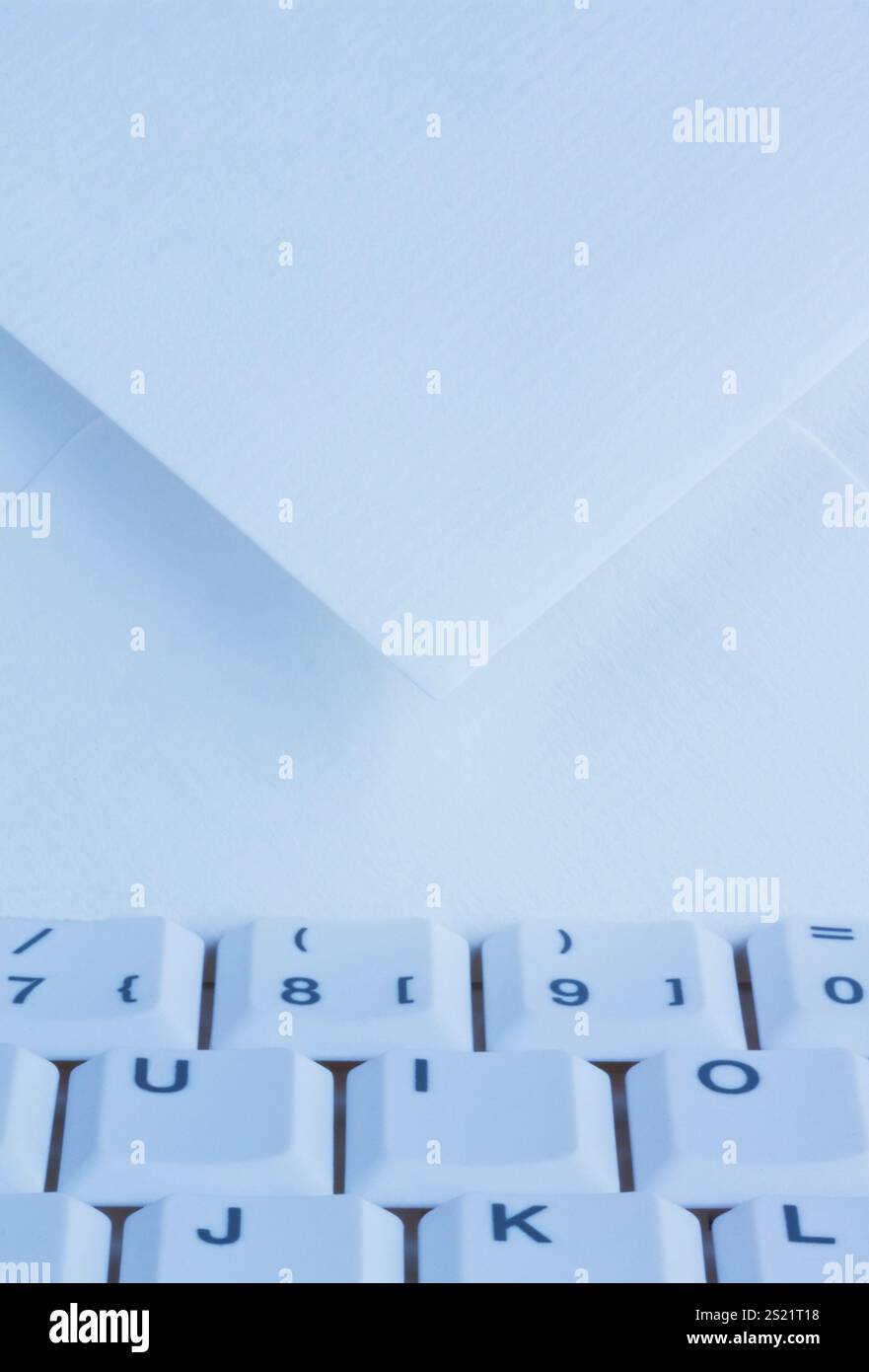 The keyboard of a computer and an envelope. Communication via e-mail ...