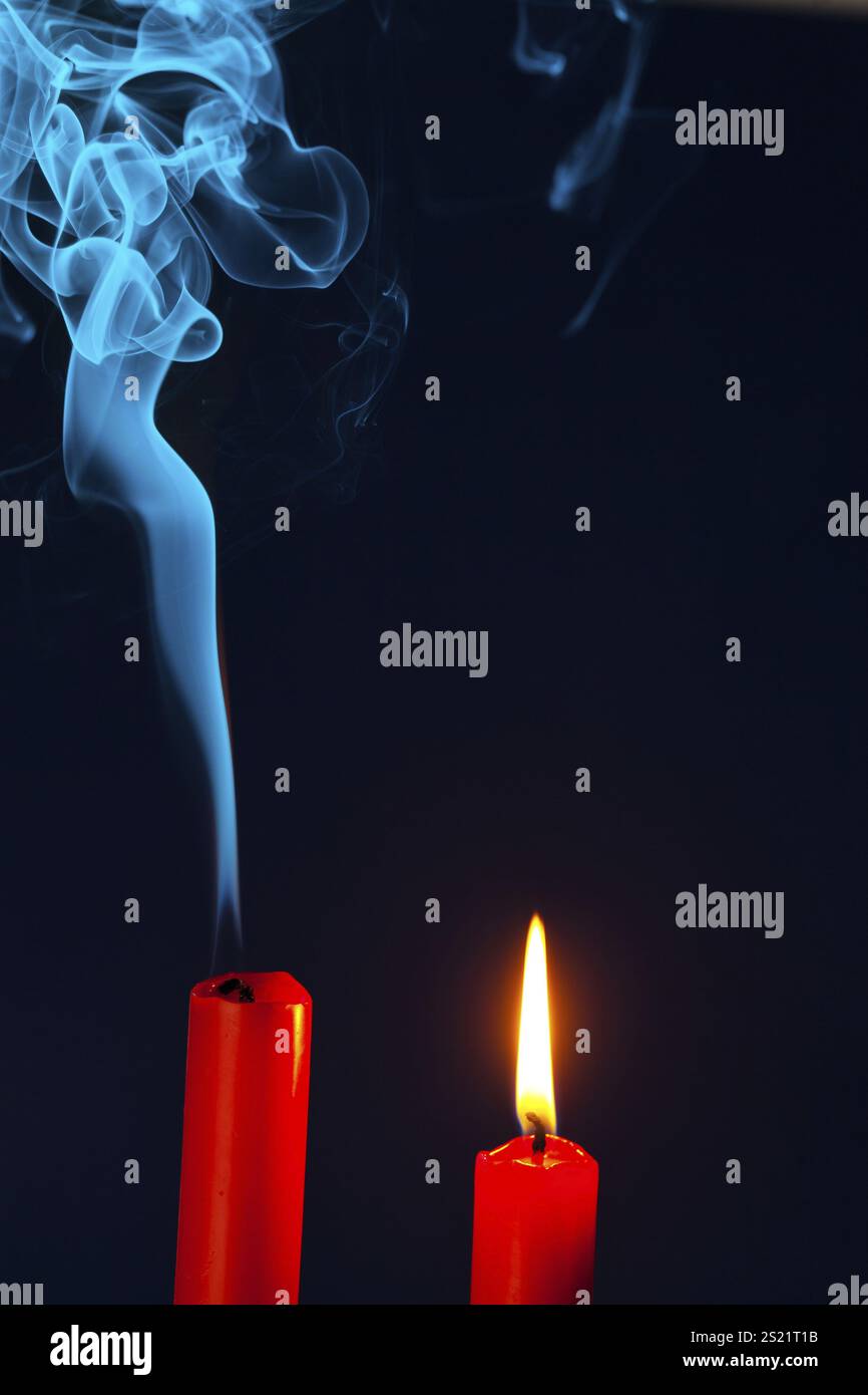 The flame of a candle was blown out. Symbolising death, dying and the ...