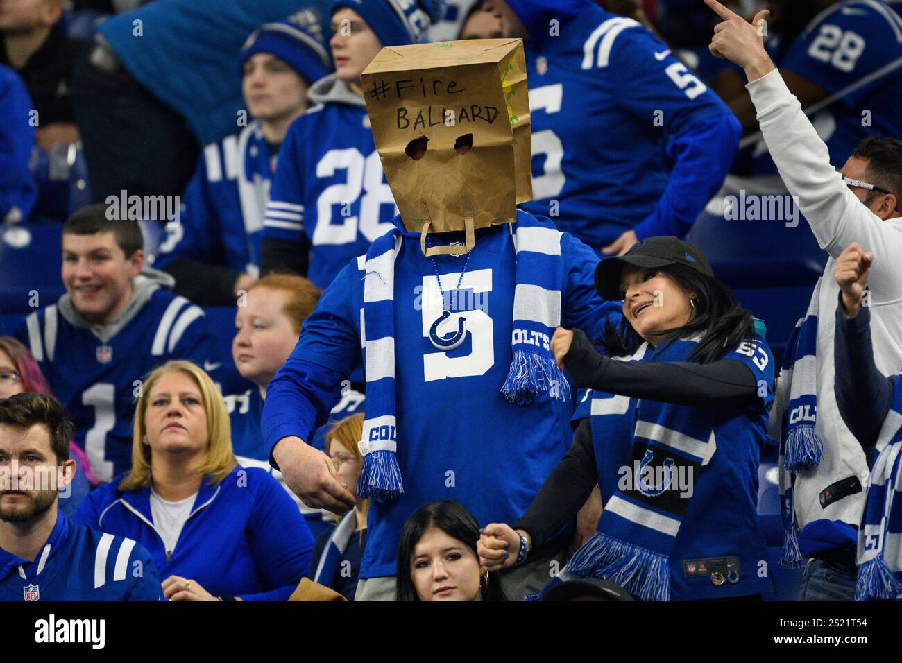 A Indianapolis Colts fan wears a bag with Fire Ballard written on it ...