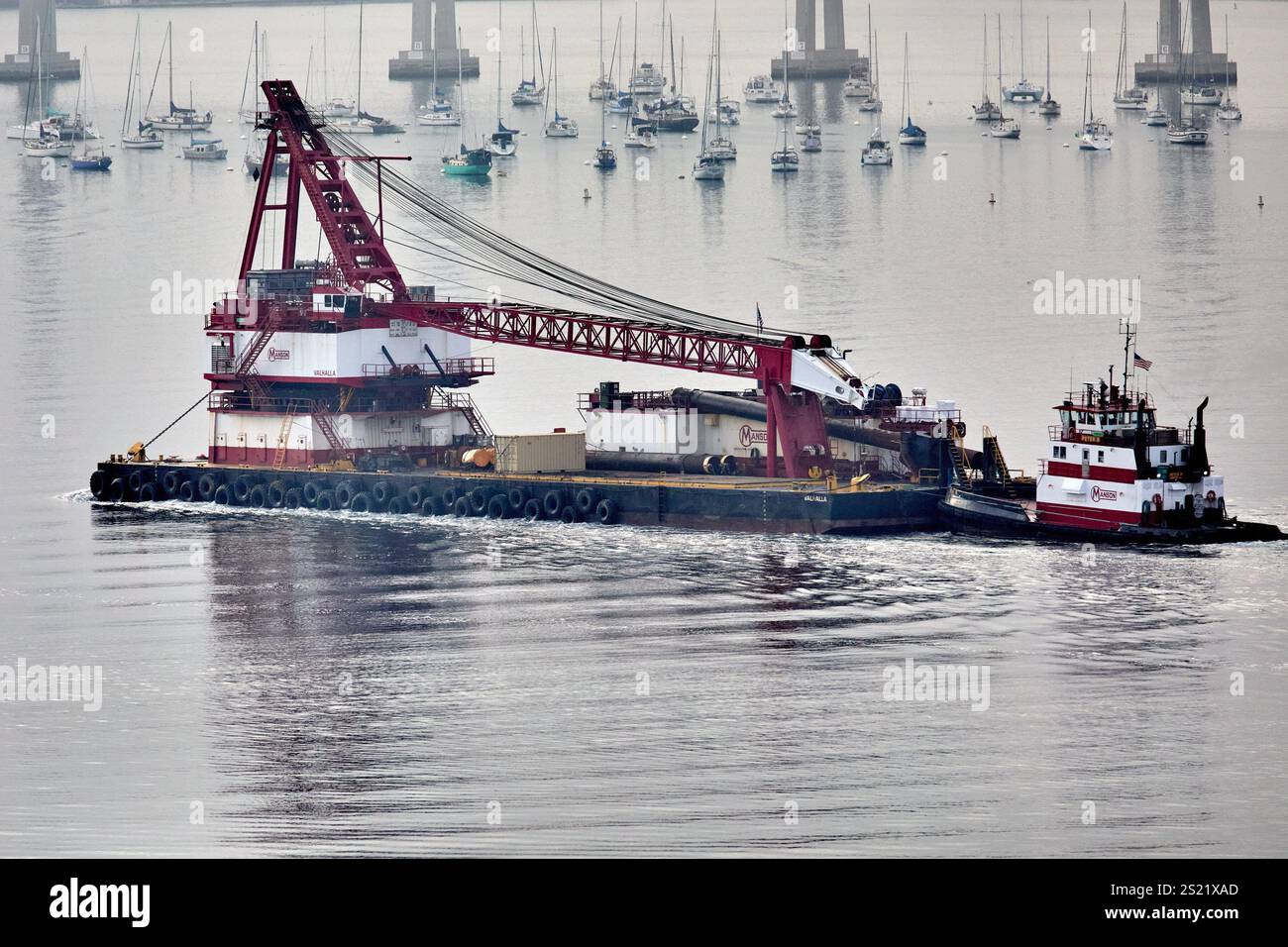 San Diego, California, USA. 23rd Dec, 2024. A large crane barge ...