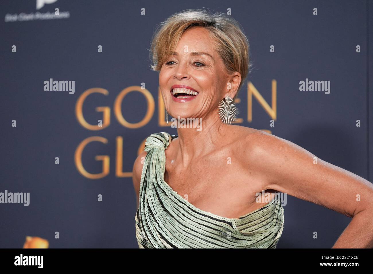 Sharon Stone poses in the press room during the 82nd Golden Globes on ...