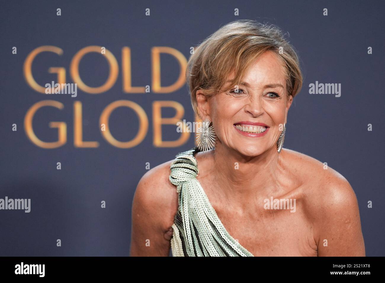Sharon Stone poses in the press room during the 82nd Golden Globes on ...