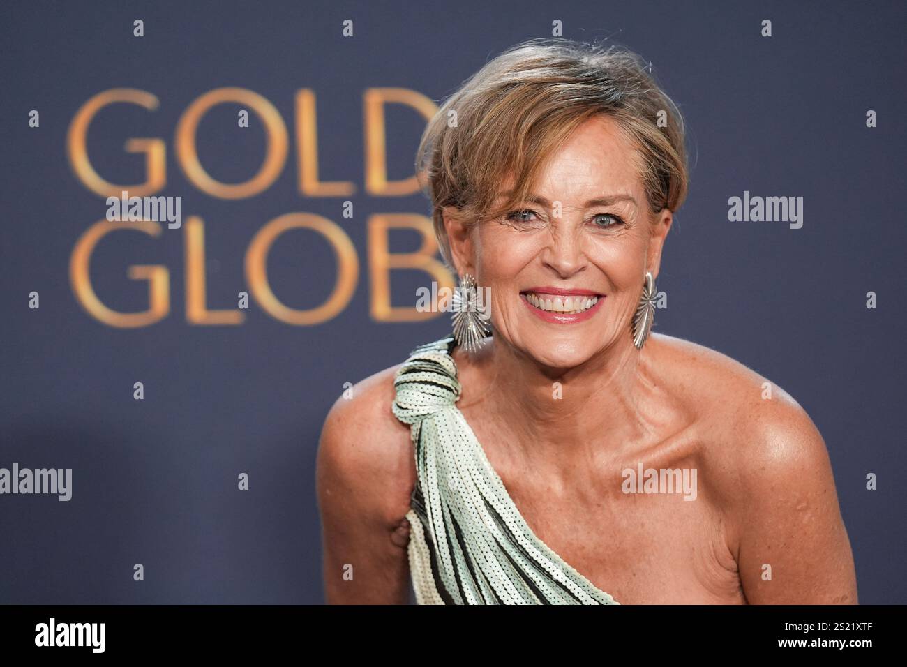 Sharon Stone poses in the press room during the 82nd Golden Globes on ...