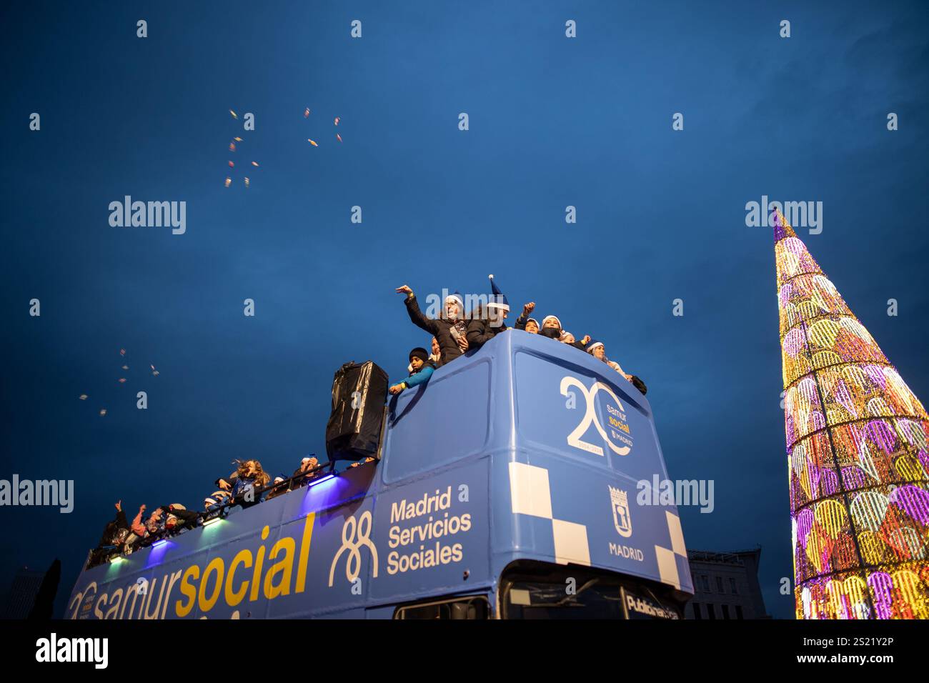 From a float its members throw candies during the parade. Once again ...