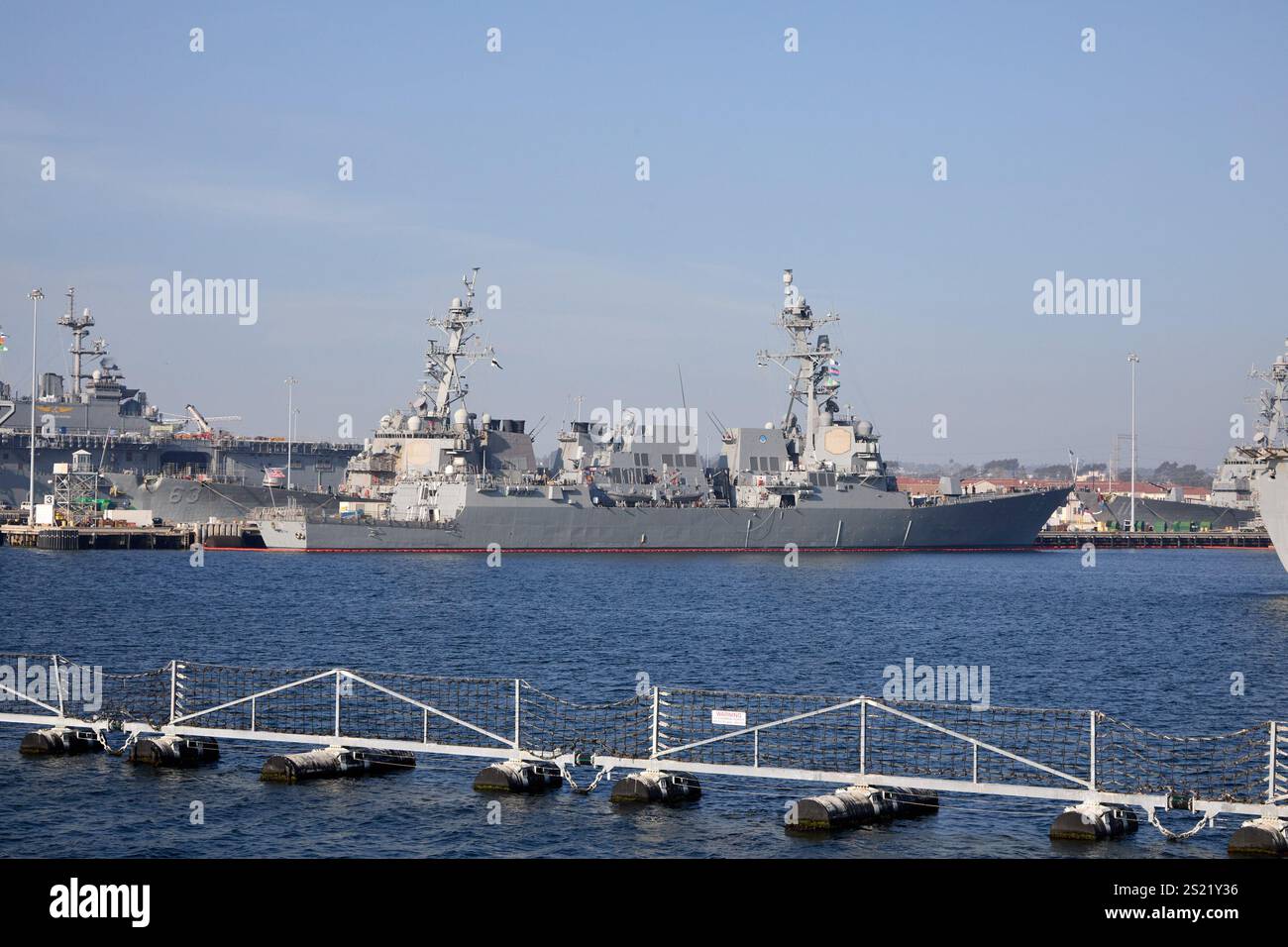 San Diego, California, USA. 21st Dec, 2024. A close-up view of two Arleigh Burke-class guided ...