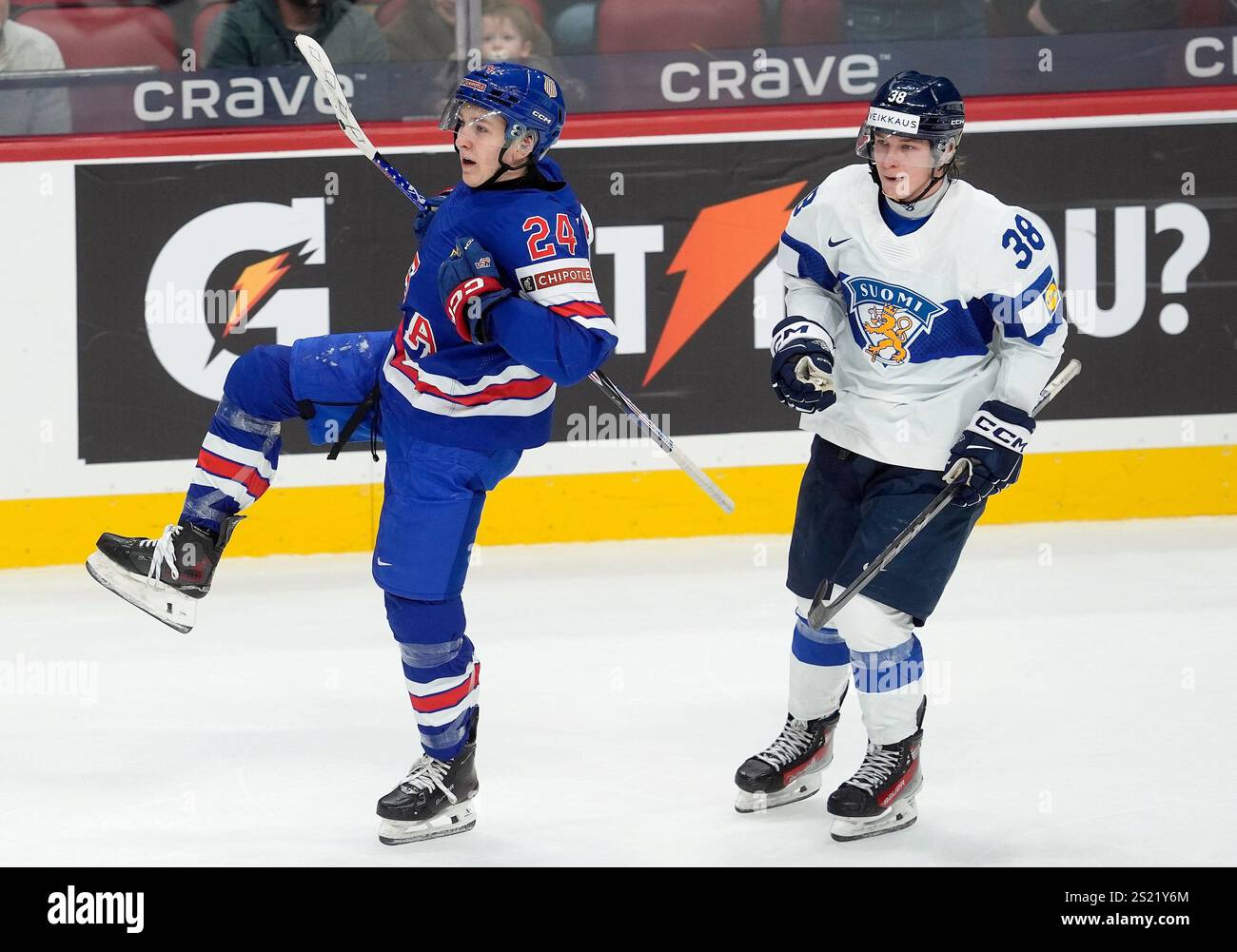 United States defenseman Cole Hutson (24) celebrates after his goal as ...