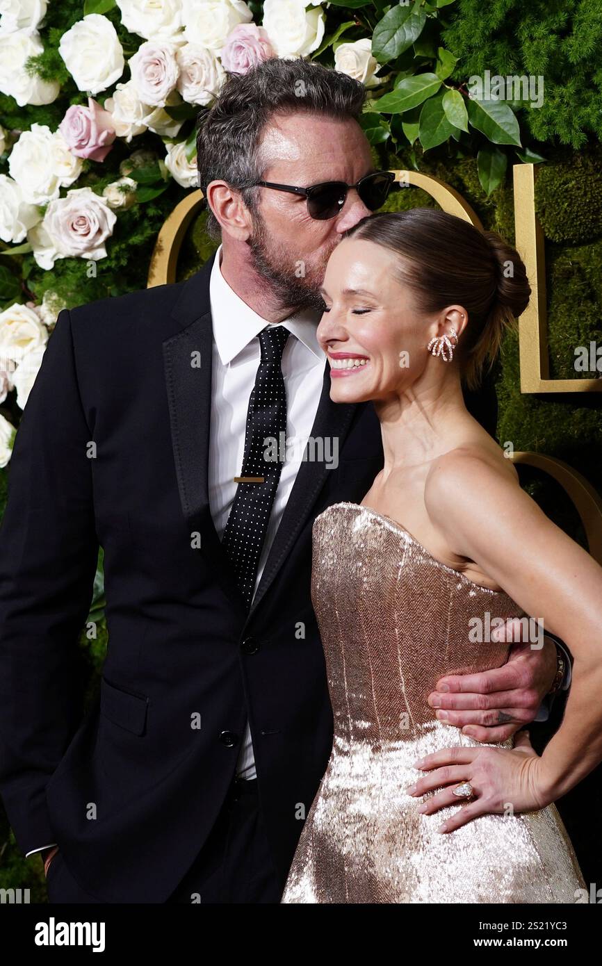 Dax Shepard, left, and Kristen Bell arrive at the 82nd Golden Globes on ...