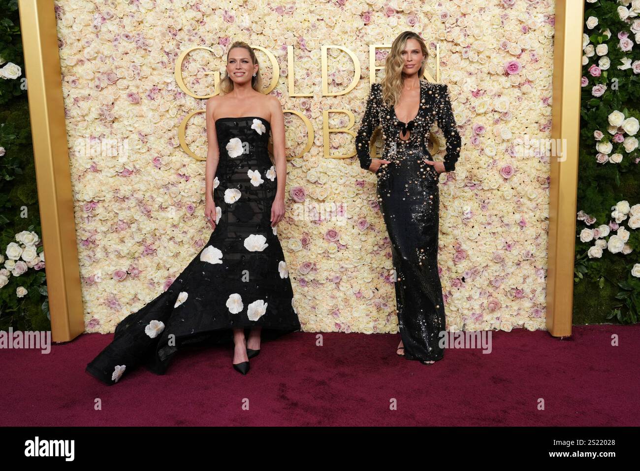 Erin Foster, left, and Sara Foster arrive at the 82nd Golden Globes on ...