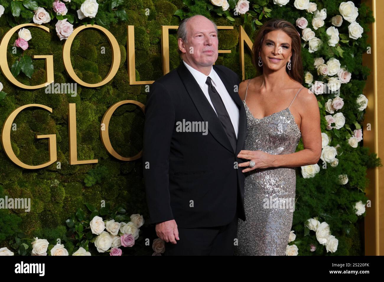 Hans Zimmer, left, and Dina De Luca arrive at the 82nd Golden Globes on ...