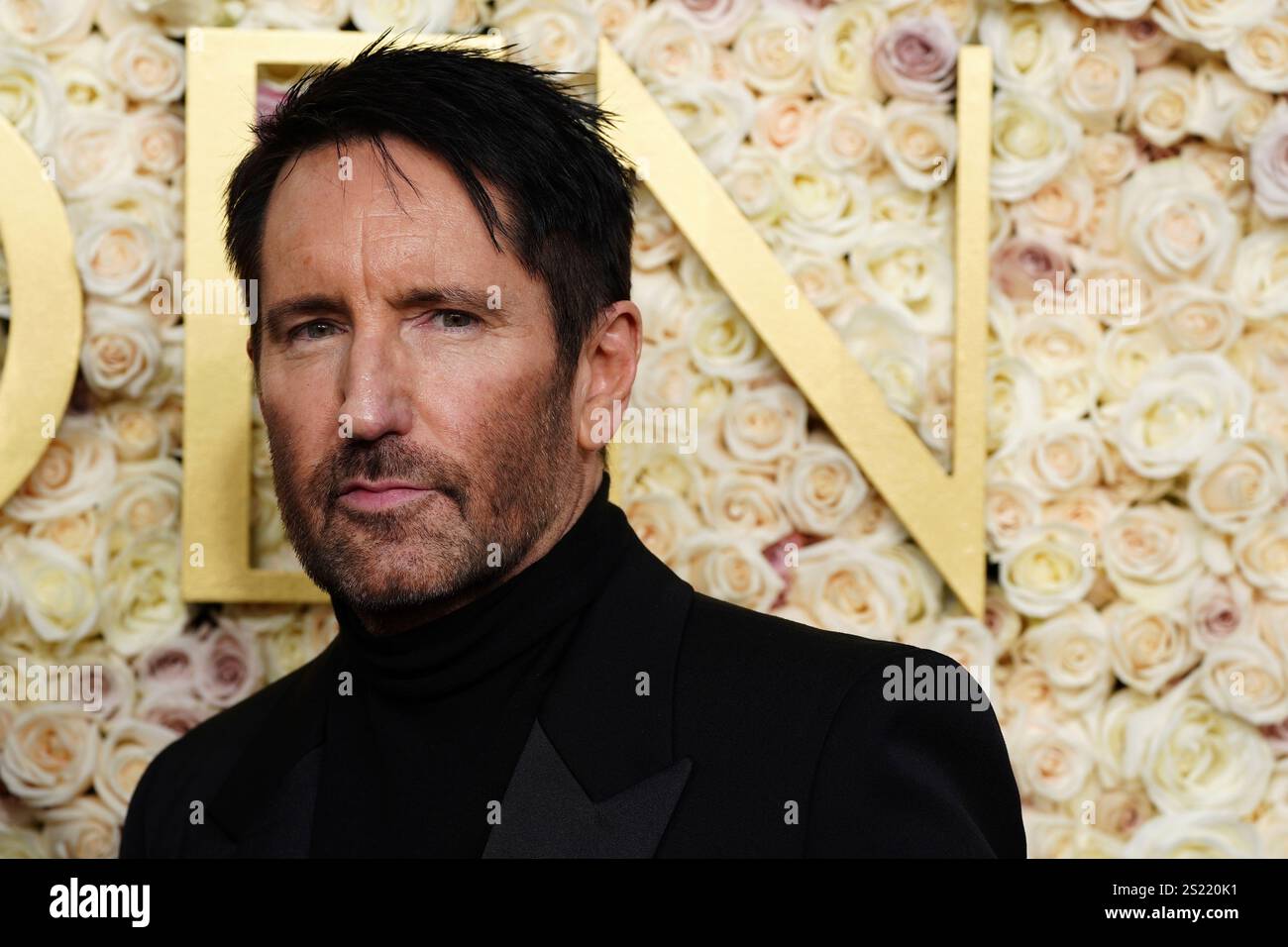 Trent Reznor arrives at the 82nd Golden Globes on Sunday, Jan. 5, 2025 ...