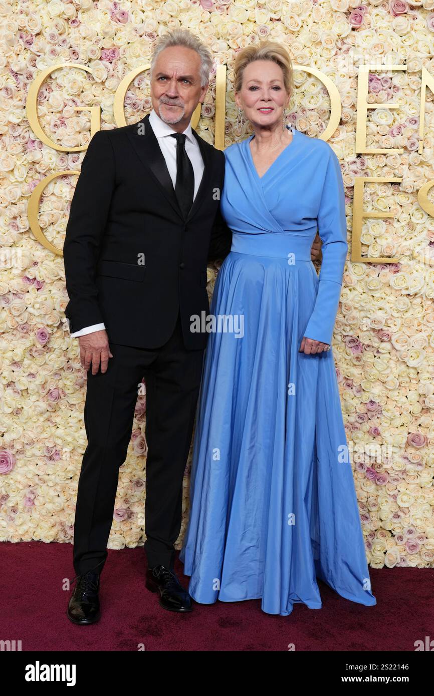 Joe Pacheco, left, and Jean Smart arrive at the 82nd Golden Globes on ...