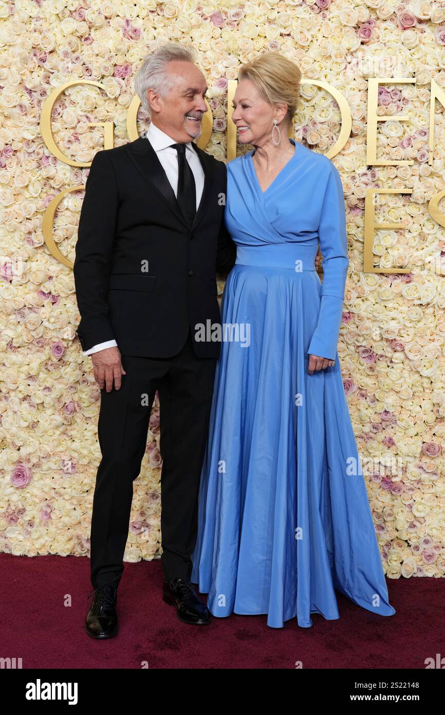Joe Pacheco, left, and Jean Smart arrive at the 82nd Golden Globes on ...
