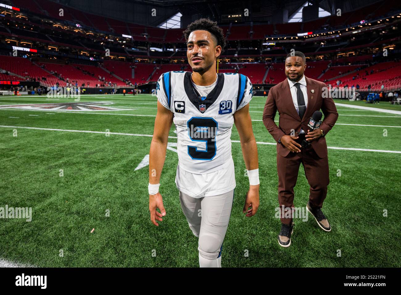 Carolina Panthers quarterback Bryce Young (9) walks off the field after ...