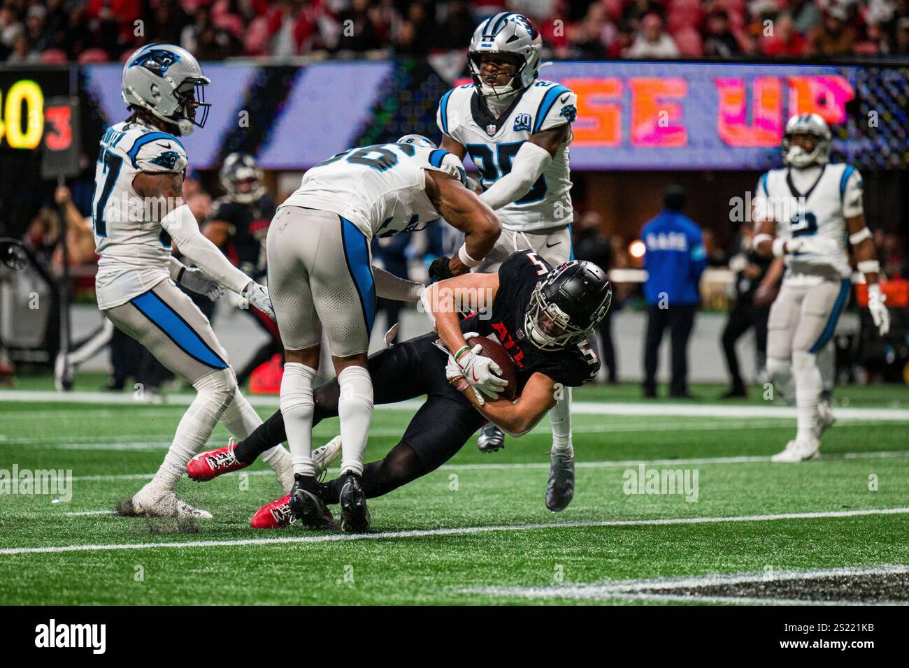 Atlanta Falcons wide receiver Drake London (5) dives into the end zone ...