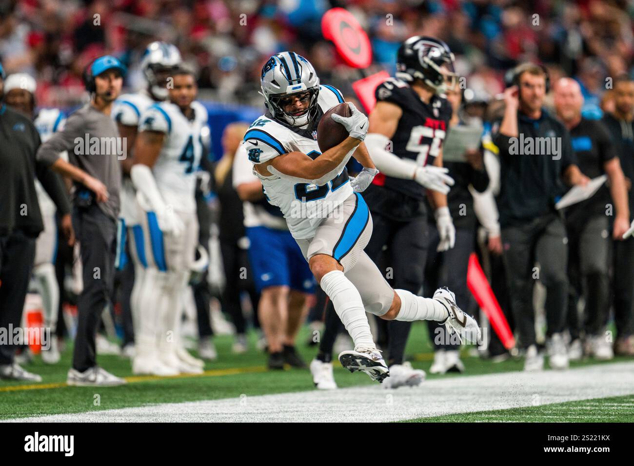 Carolina Panthers tight end Tommy Tremble (82) runs the ball during ...