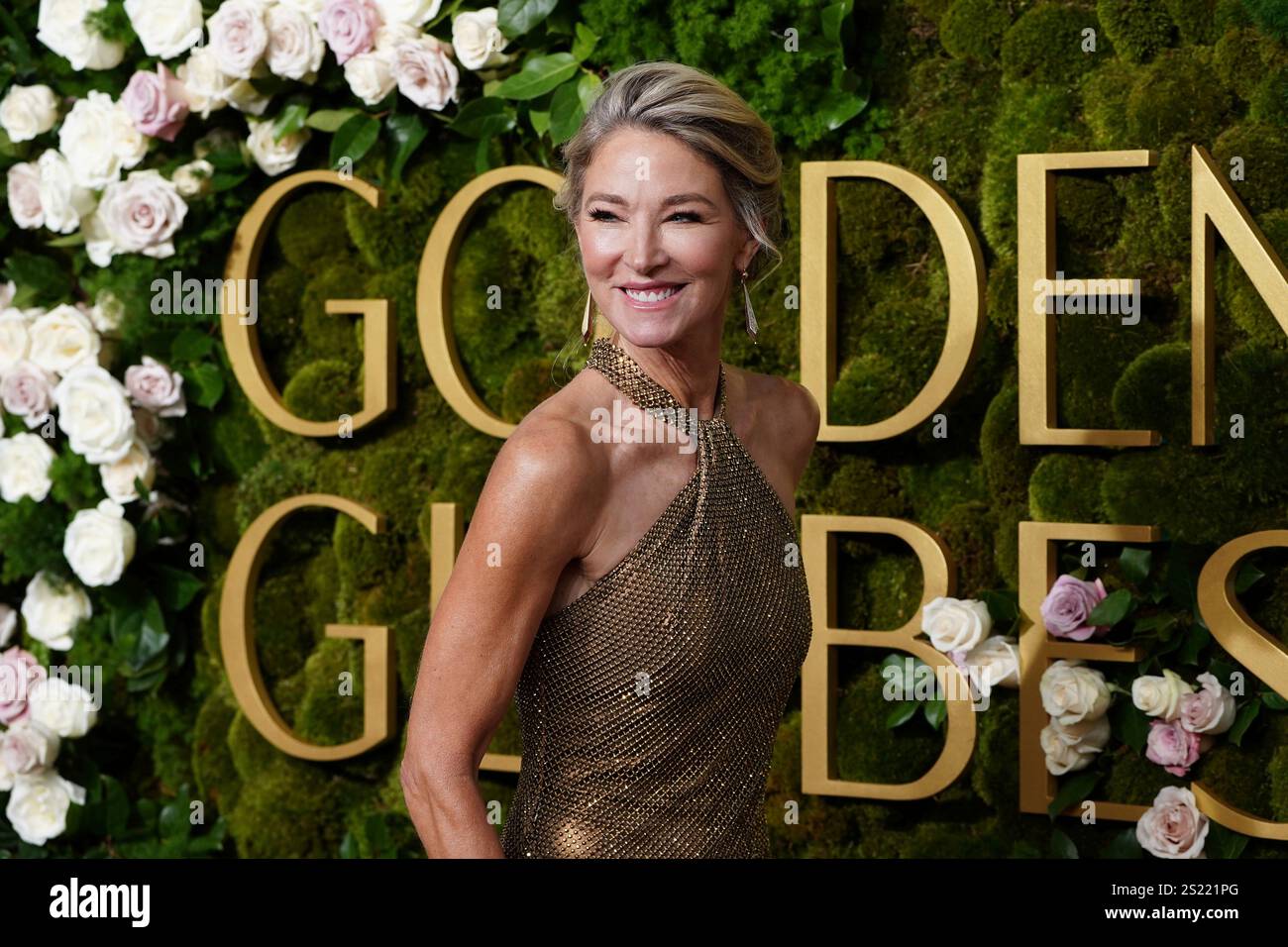 Elaine Irwin arrives at the 82nd Golden Globes on Sunday, Jan. 5, 2025 ...