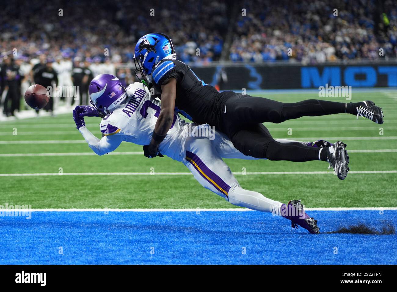Detroit Lions cornerback Terrion Arnold, right, breaks up a pass ...