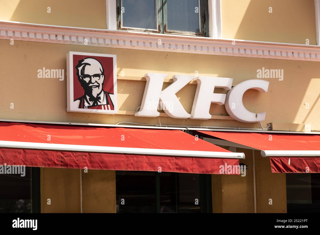 A view of a KFC (Kentucky Fried Chicken) sign on one of its branches in ...