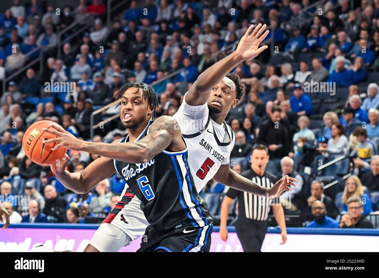 JANUARY 03, 2025: Saint Louis Billikens forward Kalu Anya (6) dumps off ...