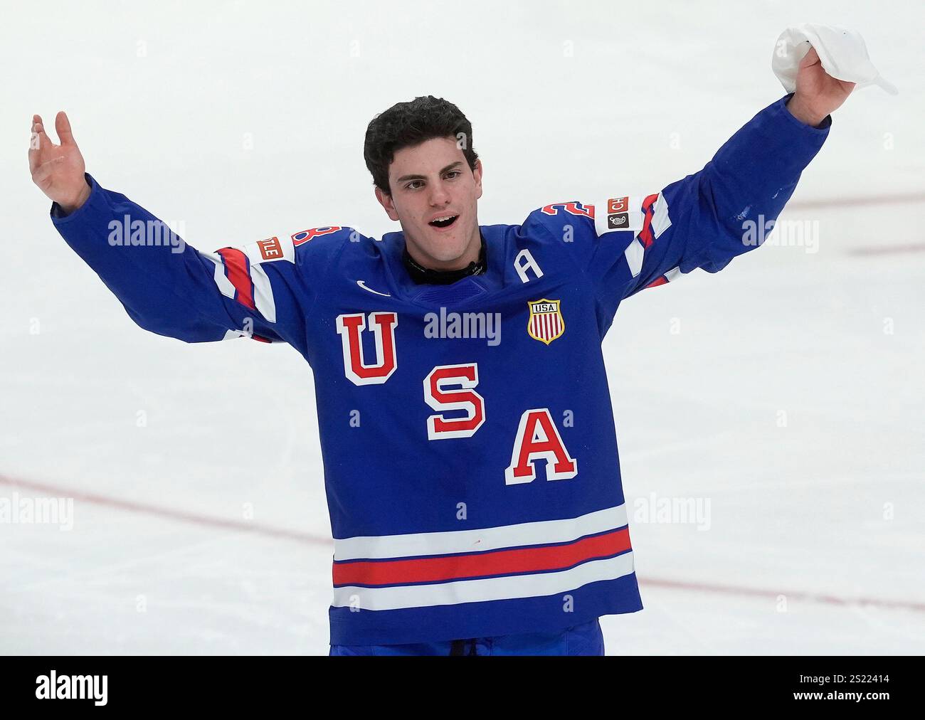 USA defenceman Zeev Buium (28) celebrates after defeating Finland in ...