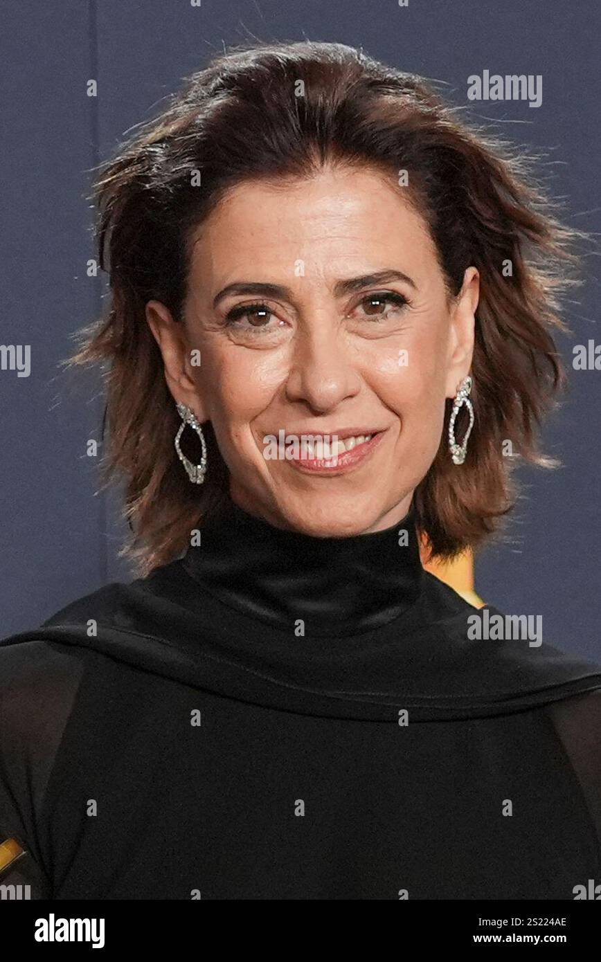 Fernanda Torres poses in the press room with the award for best ...