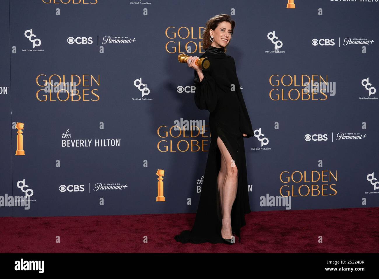 Fernanda Torres poses in the press room with the award for best ...