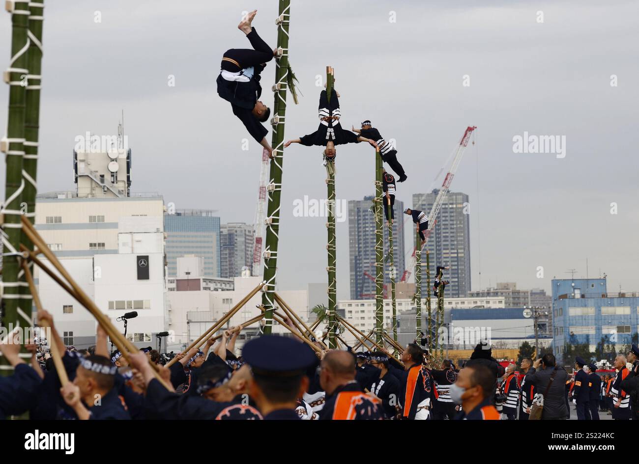 Traditional firefighting ladder acrobatics are performed at the Tokyo ...