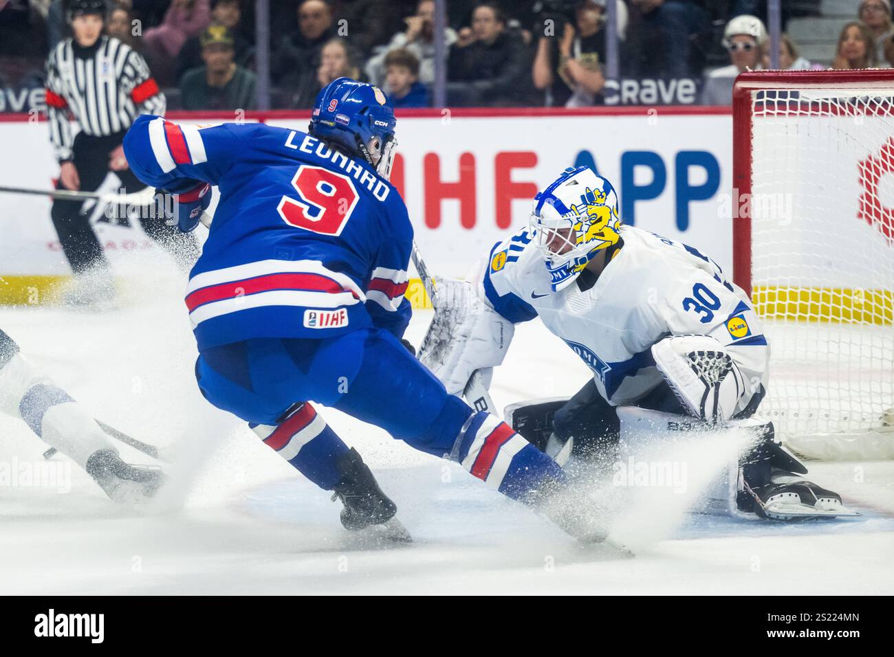 Ryan Leonard of, USA. , . and goaltender Petteri Rimpinen of Finland ...
