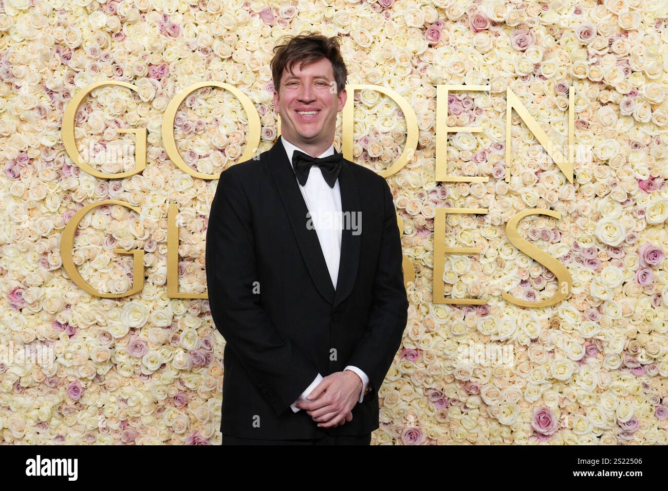 Adam Bricker arrives at the 82nd Golden Globes on Sunday, Jan. 5, 2025 ...