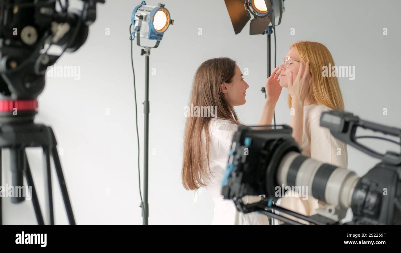 Preparation model. Work stylist photo. Brunette corrects hair blonde ...