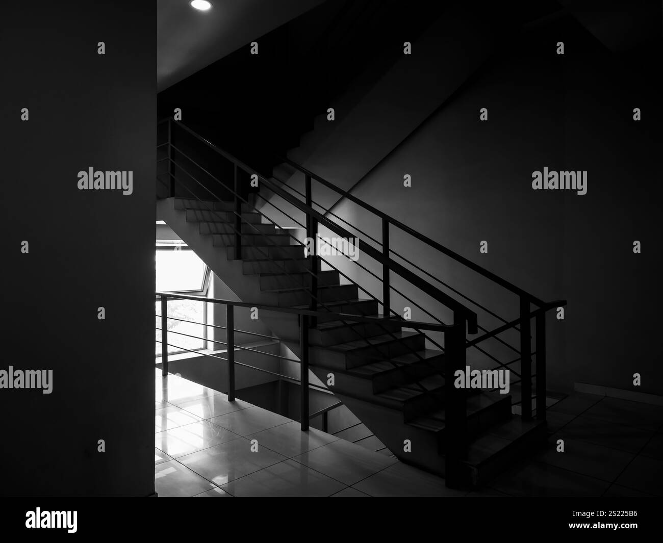 Scene of dark mysterious cement stairs in lonely quiet building on ...