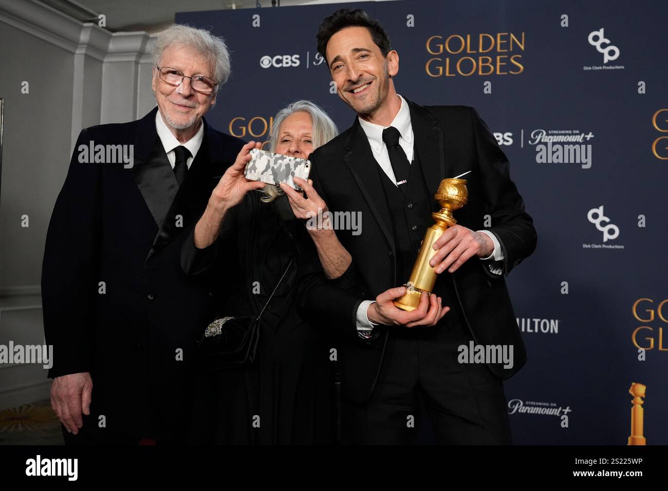 Elliot Brody, from left, Sylvia Plachy, and Adrien Brody, winner of the ...