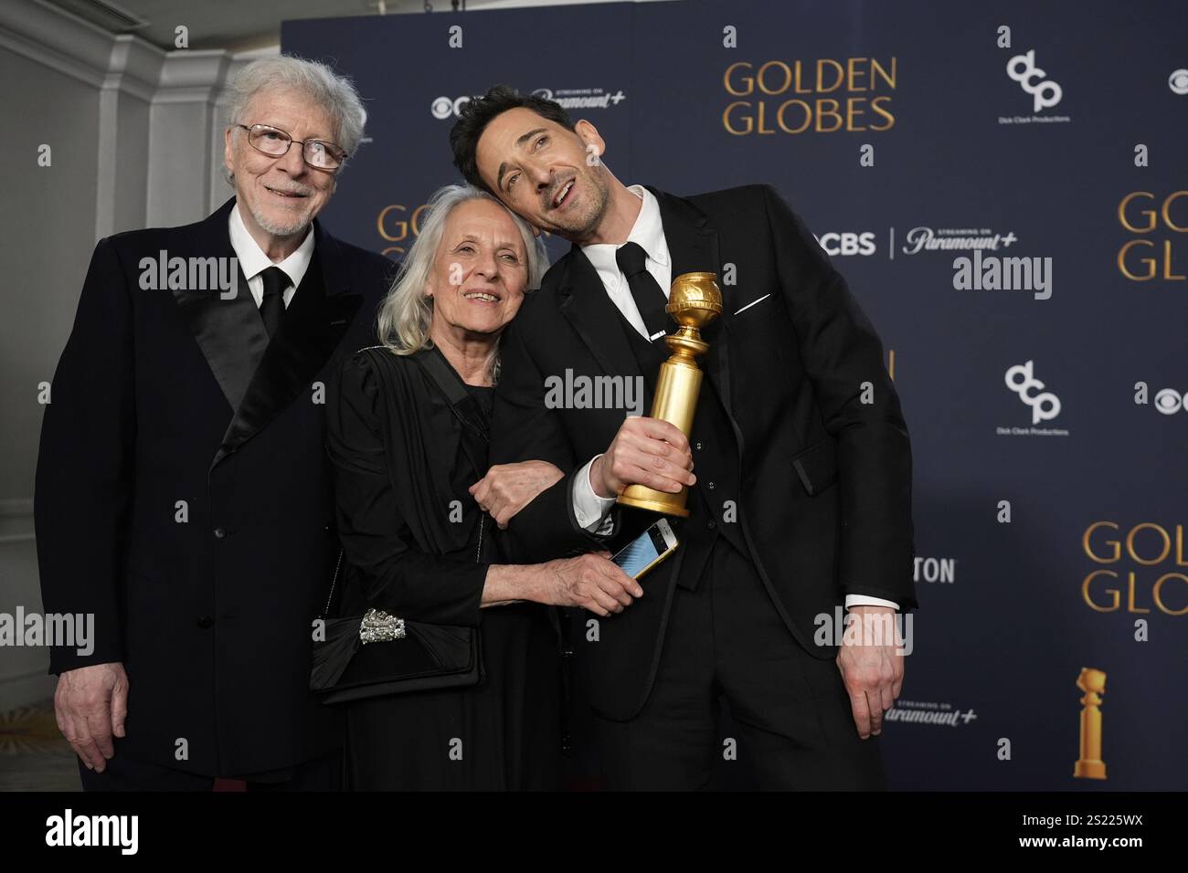Elliot Brody, from left, Sylvia Plachy, and Adrien Brody, winner of the ...