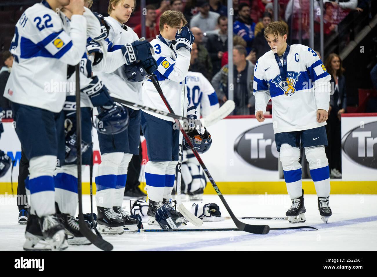 Aron Kiviharju of, Finland. , . looks dejected after the 2025 IIHF ...