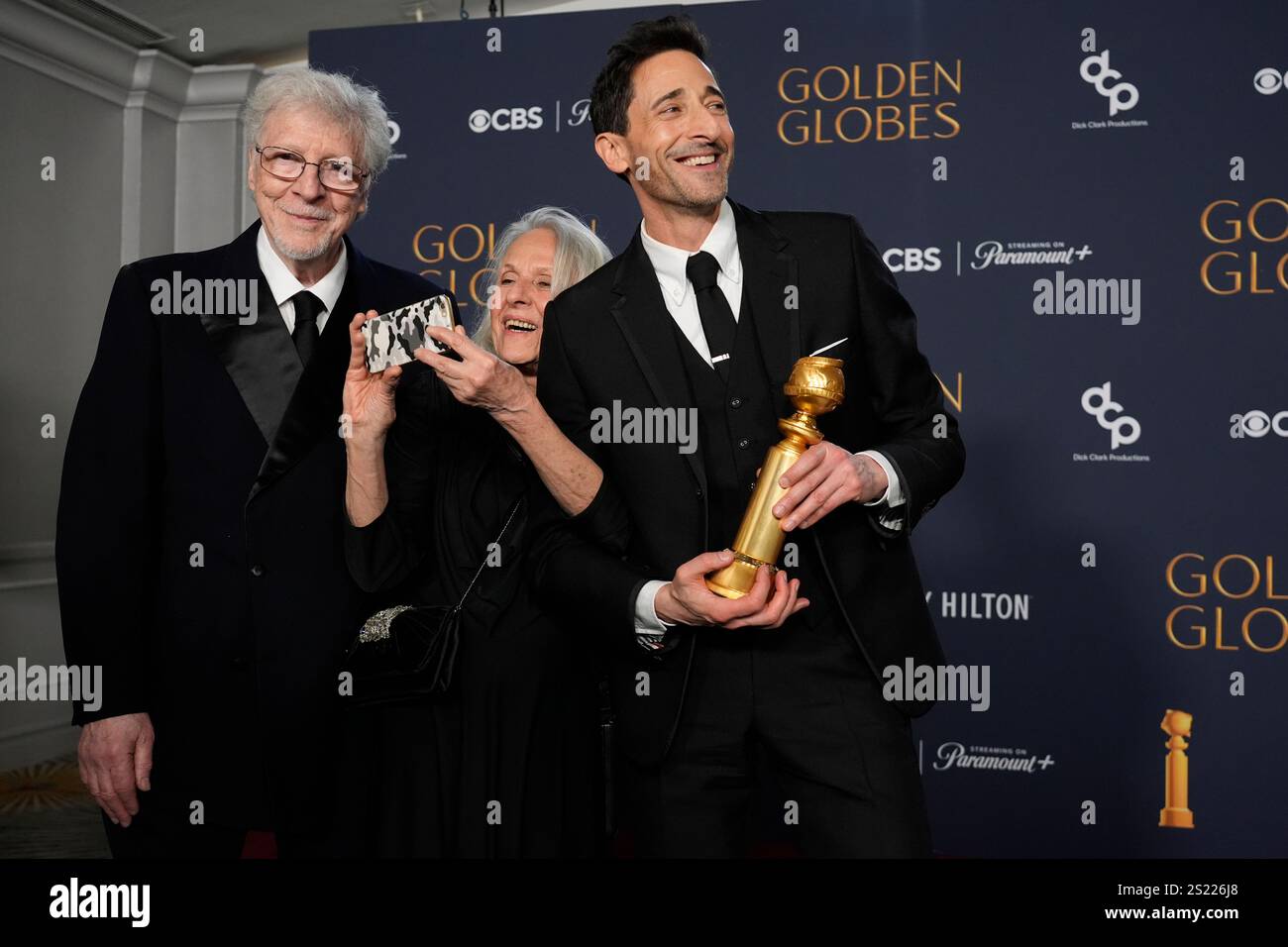 Elliot Brody, from left, Sylvia Plachy, and Adrien Brody, winner of the ...