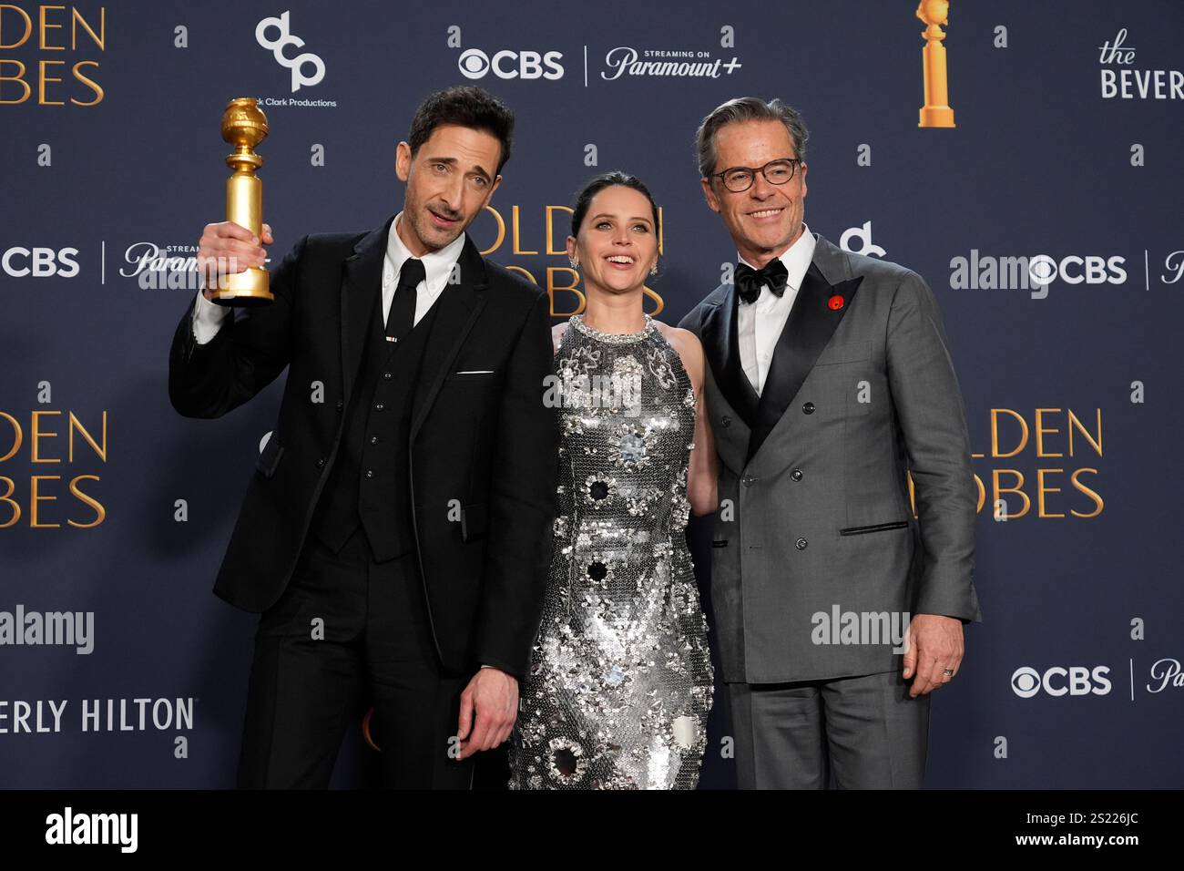 Adrien Brody, winner of the award for best performance by a male actor in a motion picture drama ...